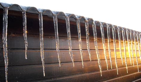 Think Twice Before Removing Ice Dams Yourself