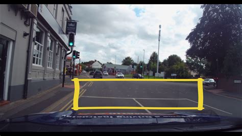 Driving Lessons Teaching A Pupil To Deal With Traffic Lights In The Uk