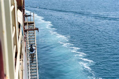 Navigational Pilot Entering Cargo Ship Using Pilot Gangway He Will