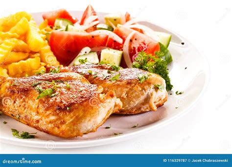 Fried Chicken Breast French Fries And Vegetable Salad Stock Image