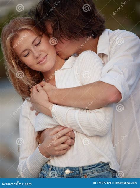 Love Kiss And Couple Hug Quality Time And Celebration With Smile Relationship And Affection