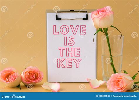 Love Is The Key Text On Greeting Card Paper Note Delicate Pink Roses