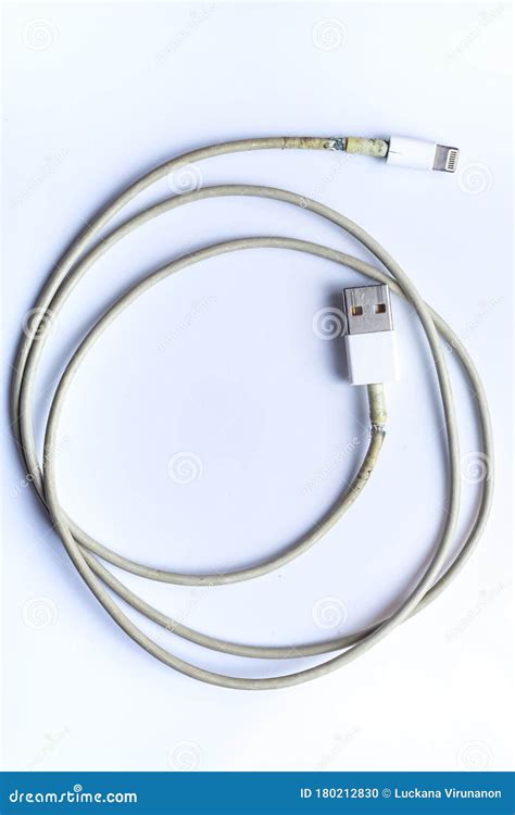 Damaged White Usb Cable Plug And Micro Usb Plug Or Old Smart Phone Charger Cable Broken On White