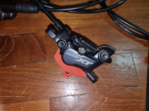 Shimano Xt M8120 4 Piston Brake Set Sports Equipment Bicycles And Parts