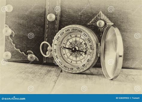 Antique Compass On Wooden Table Black And White Style Old Photo Stock