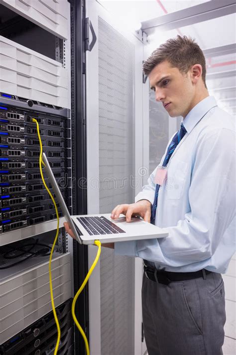 Technician Using Laptop While Analysing Server Stock Image Image Of Person Data 57340925