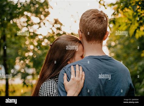 Girl Put Her Head On His Shoulder Love In The Park Teen Couple Stock