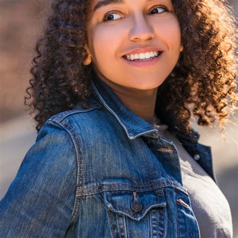 Outdoor Portrait Of Beautiful Happy Mixed Race African American Girl