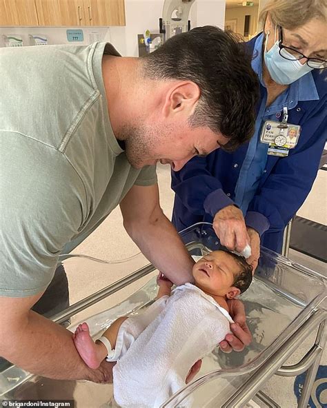 Mitchell Moses And Partner Bri Share Sweet Footage Of Their Newborn Daughter Daily Mail Online