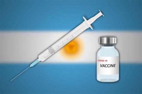 アルゼンチンの国旗とぼかしの背景に注射器とワクチンのバイアル プレミアムベクター
