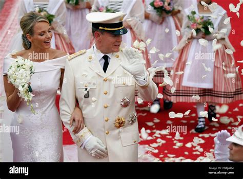 Monacos Prince Albert Ii And Princess Charlene Leave After The