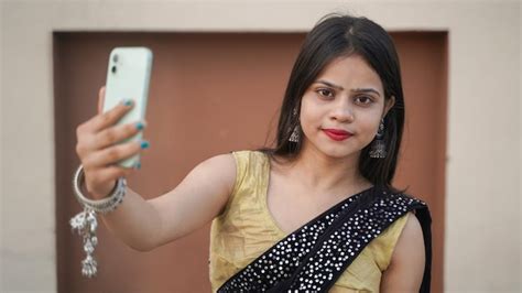 Premium Photo Beautiful Indian Girl Taking Selfie On Her Mobile Phone