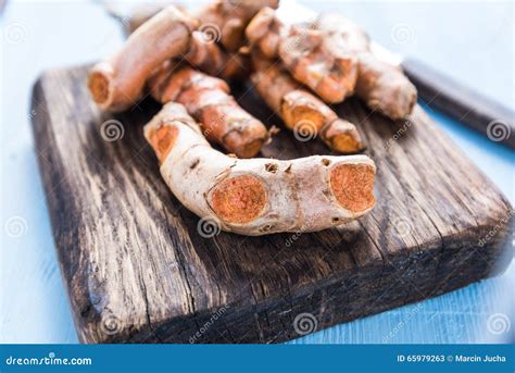 Garden Fresh Tumeric Spice Root On Wooden Board Stock Image Image Of