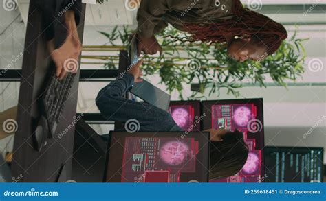 Vertical Video Team Of System Engineers Having Web Server Hacked Stock