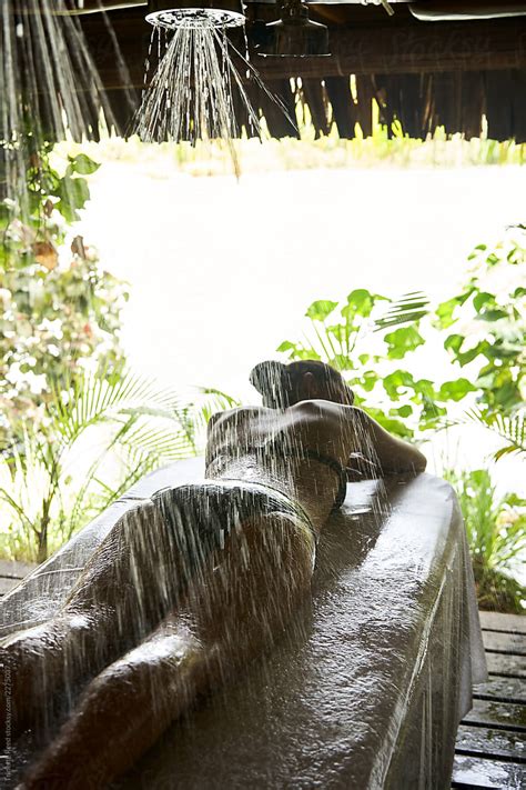 Woman Receiving A Vichy Shower Massage At Luxury Spa By Stocksy Contributor Trinette Reed