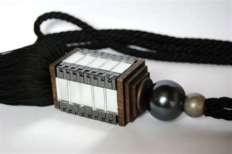 Contemporary Tassel Tieback With Hematite And Mirror Available From