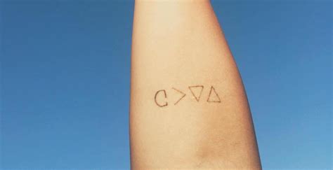 14 Amazing Greater Than Tattoo Ideas For Your Inspiration