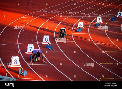Sprinters Ready To Begin The 200m Race Captured At The Precise Moment