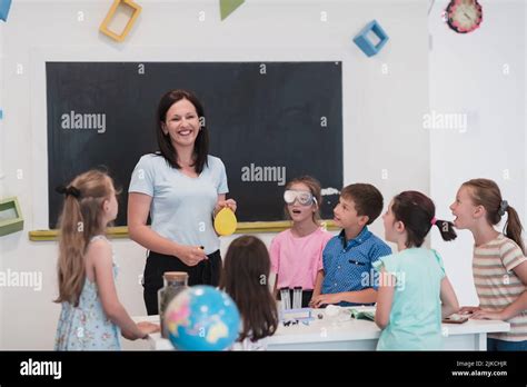 Elementary School Science Classroom Enthusiastic Teacher Explains