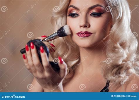 Beautiful Young Blonde Makes A Bright Holiday Makeup Glamorous Make Up