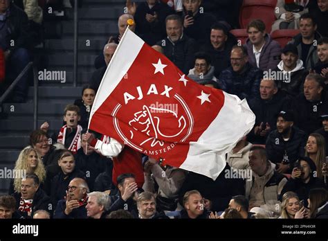 Amsterdam Fan With An Ajax Flag In The Stands During The Dutch Premier League Match Between