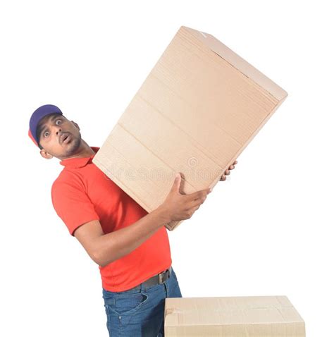 Guy With Heavy Carton And Tired Look On Blue Background Stock Photo Image Of Male Face