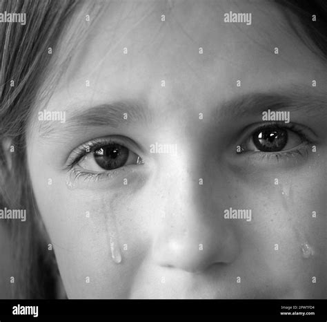 Girl Crying With Tears On Her Face Of Cheek Rolling Down Sad And Upset