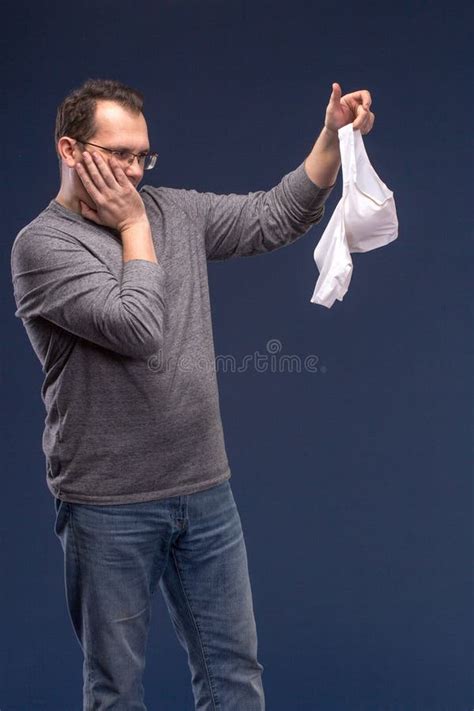 Bra Holding Man Stock Photos Free Royalty Free Stock Photos From Dreamstime