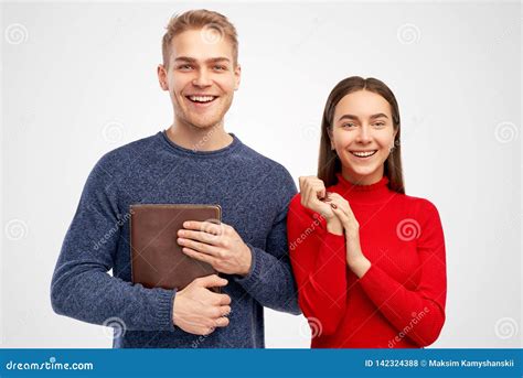 Photo Of Happy Young Female Gives Some Ideas For Writing Essay To Classmate Who Holds Notepad