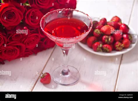 Red Exotic Alcoholic Cocktail In Clear Glass Plate With Fresh