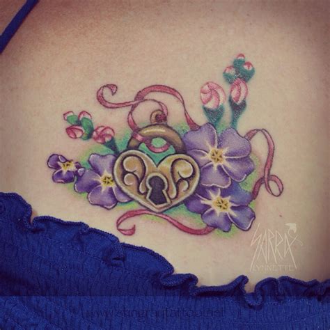 Heart Locket And Flowers Tattoo By Sarra Lynnette At Stingray Tattoo