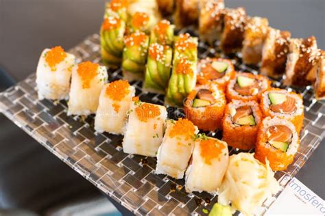 Overhead Japanese Sushi Food Maki Ands Rolls With Tuna Salmon Shrimp Crab And Avocado Top