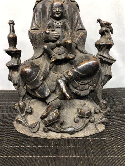 臻品收藏回流老貨紫銅佛像包漿醇厚老味十足制作精美工藝渾厚大氣分量十足溫潤熟美愛不釋手韻味十足等待有緣人長5908華夏連鎖