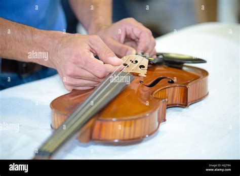 Fixing The String Stock Photo Alamy