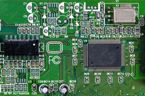 Premium Photo Closeup Shot Of Microchip On Green Printed Circuit Board Computer Motherboard