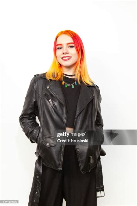 Studio Portrait Of An 18 Year Old White Woman With Brightly Dyed Hair