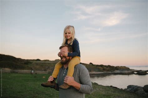 Dad And Daughter Outside Together By Stocksy Contributor Rob And