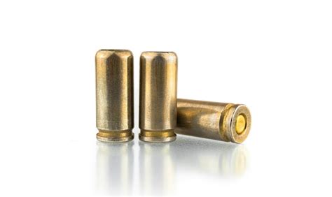 premium photo pistol bullets isolated on white background 9mm shells