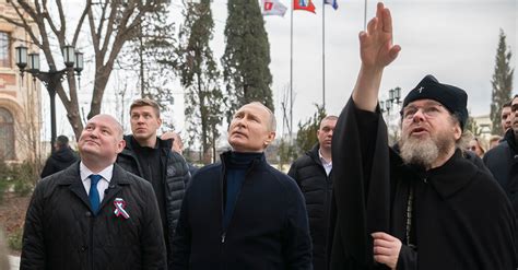 Putin Visits Occupied Crimea A Day After War Crimes Warrant The New