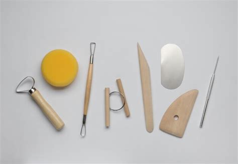 Premium Photo Set Of Clay Modeling Tools On White Background Flat Lay
