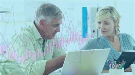 Analyst Typing And Pointing Colleague Writing Notes For Finance Review