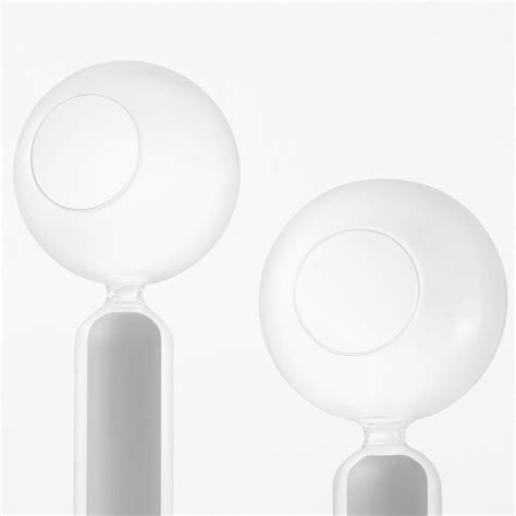 Nendo Designs Helmet Shaped Vessels And Cascading Tables For Zens
