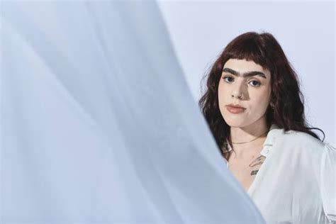 Woman With Monobrow Photos By Canva