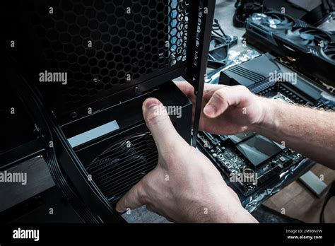 Powerful Modern Desktop Computer Workstation Building By Caucasian