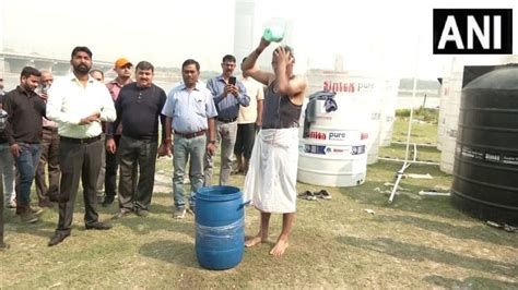 Director Of Delhi Jal Board Takes A Dip In Yamuna After Bjp Mp S