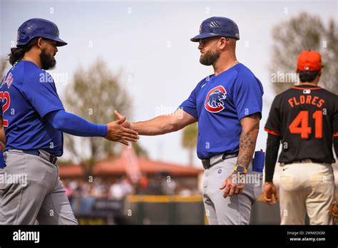 Chicago Cubs First Base Coach Mike Napoli 55 Slaps Catcher Jorge