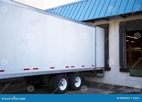 Long Semi Trailer Loading Industrial Cargo In Warehouse Dock Wit Stock Image