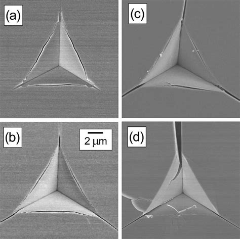 sem micrographs of 500 mn indentations on fused silica with probes of