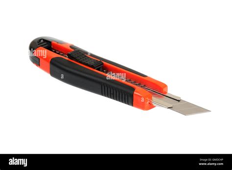 Red stationery knife Stock Photo - Alamy