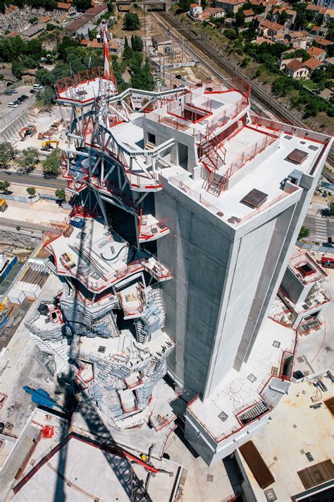 Construction Photographs Revealed For Frank Gehrys Mountainous